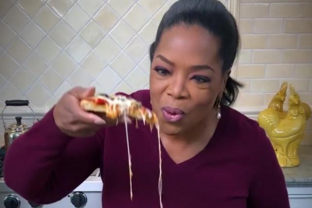 Oprah's got the cheese-pull down in social ads for new pizza | Ad Age