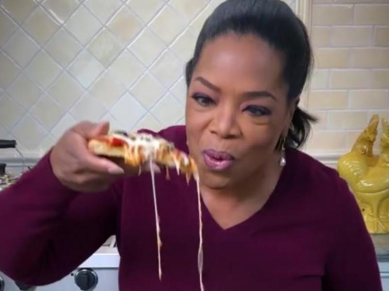 Watch: Oprah has the cheese-pull down in her new pizza ad | Ad Age