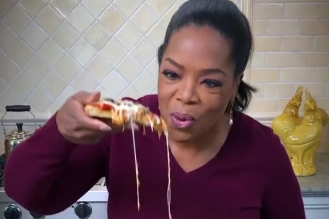 Oprah's got the cheese-pull down in social ads for new pizza | Ad Age